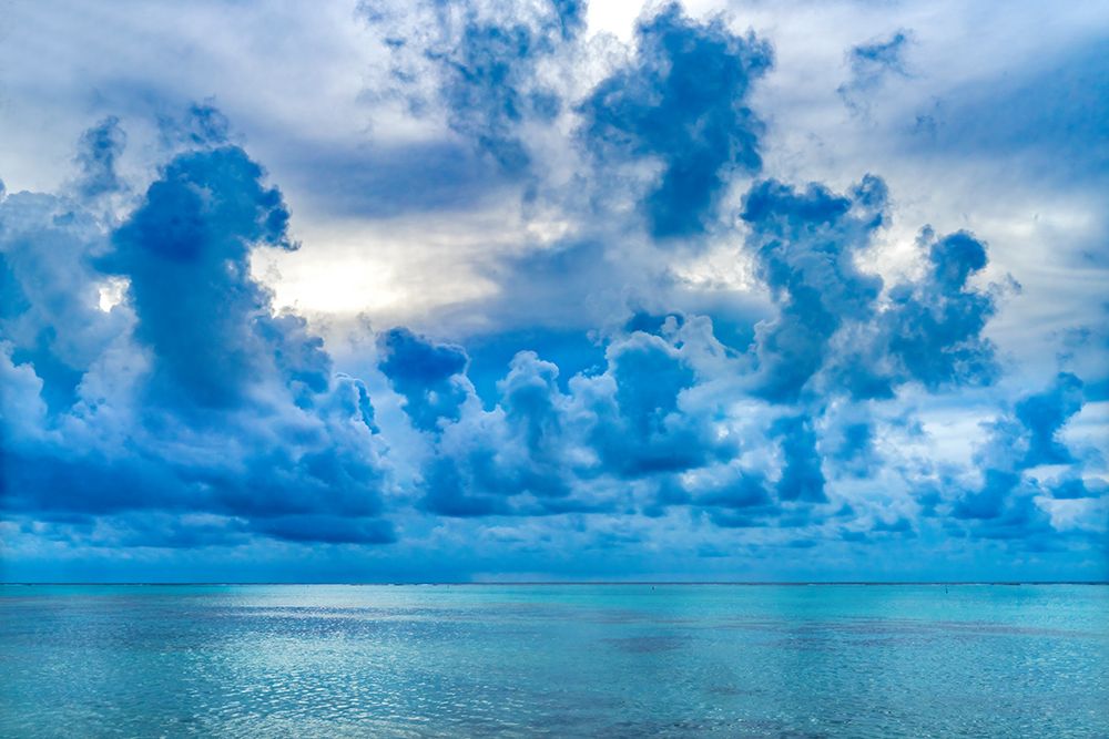 Cloudscape-Moorea-Tahiti-French Polynesia. Blue colors in water in ...